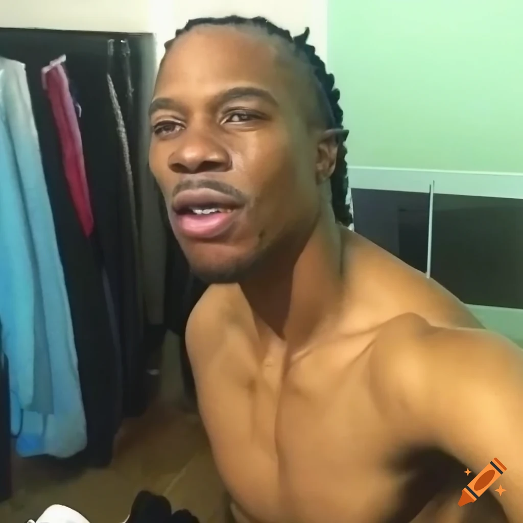 Mirror selfie of a strong African American man with short dreadlocks on ...